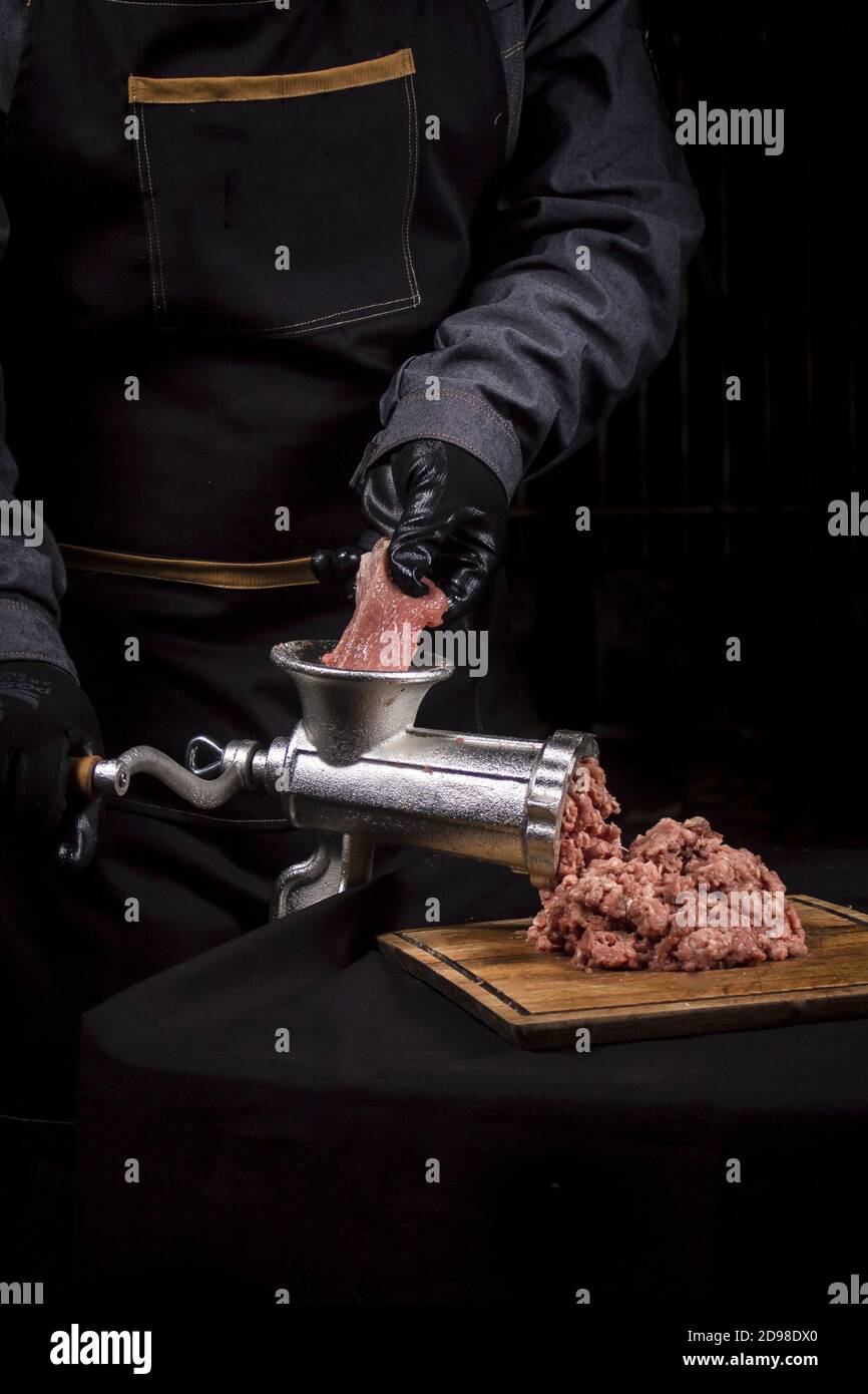 Human meat grinder hi-res stock photography and images - Alamy