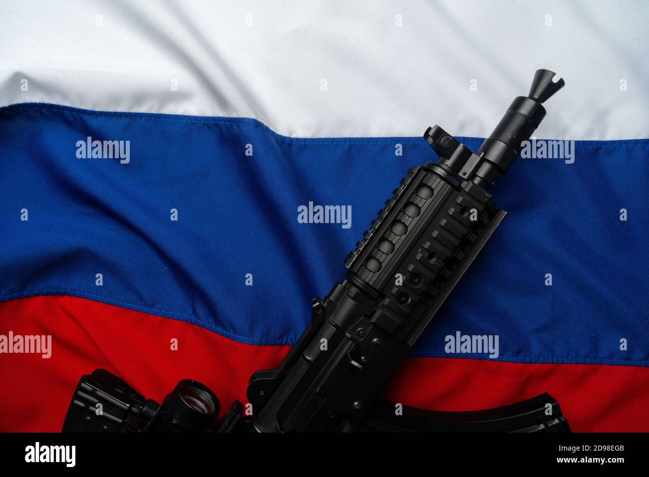 Flag of Russia and rifle gun on it Stock Photo - Alamy