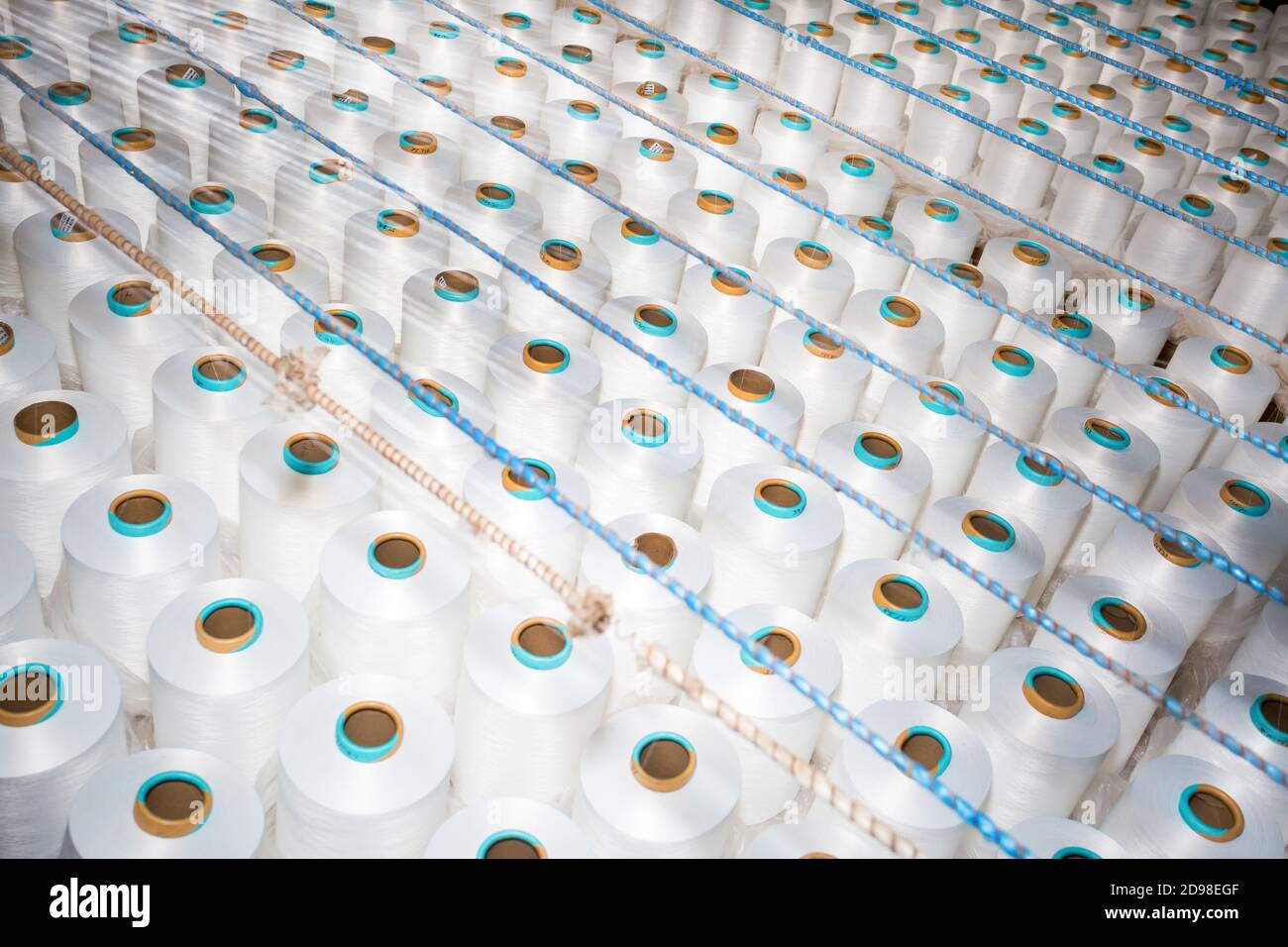 Yarn spools in a textile factory hi-res stock photography and images ...