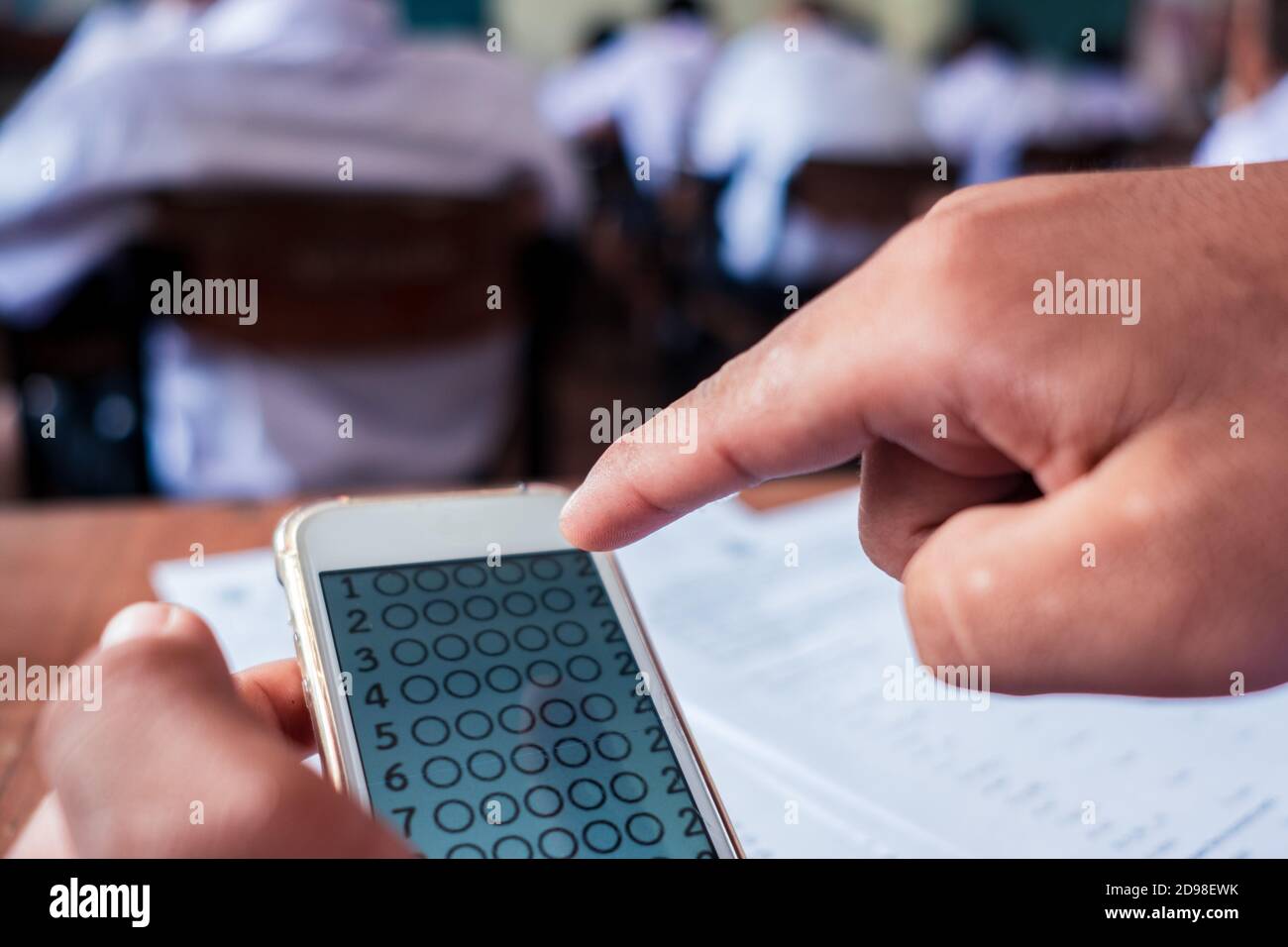 High school student taking exam uniform hi-res stock photography and ...