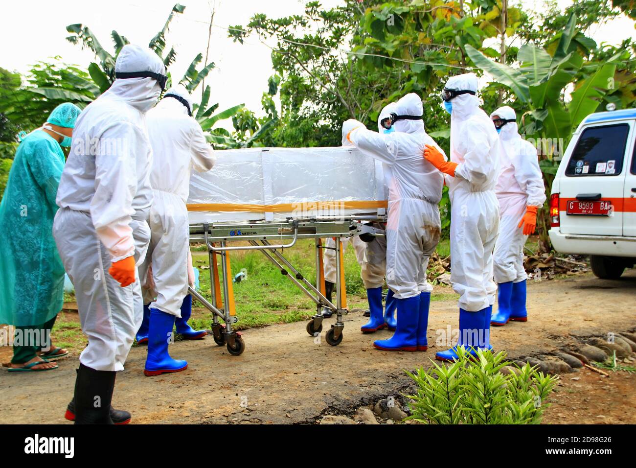 The funeral process of a corpse infected with the corona virus with the ...
