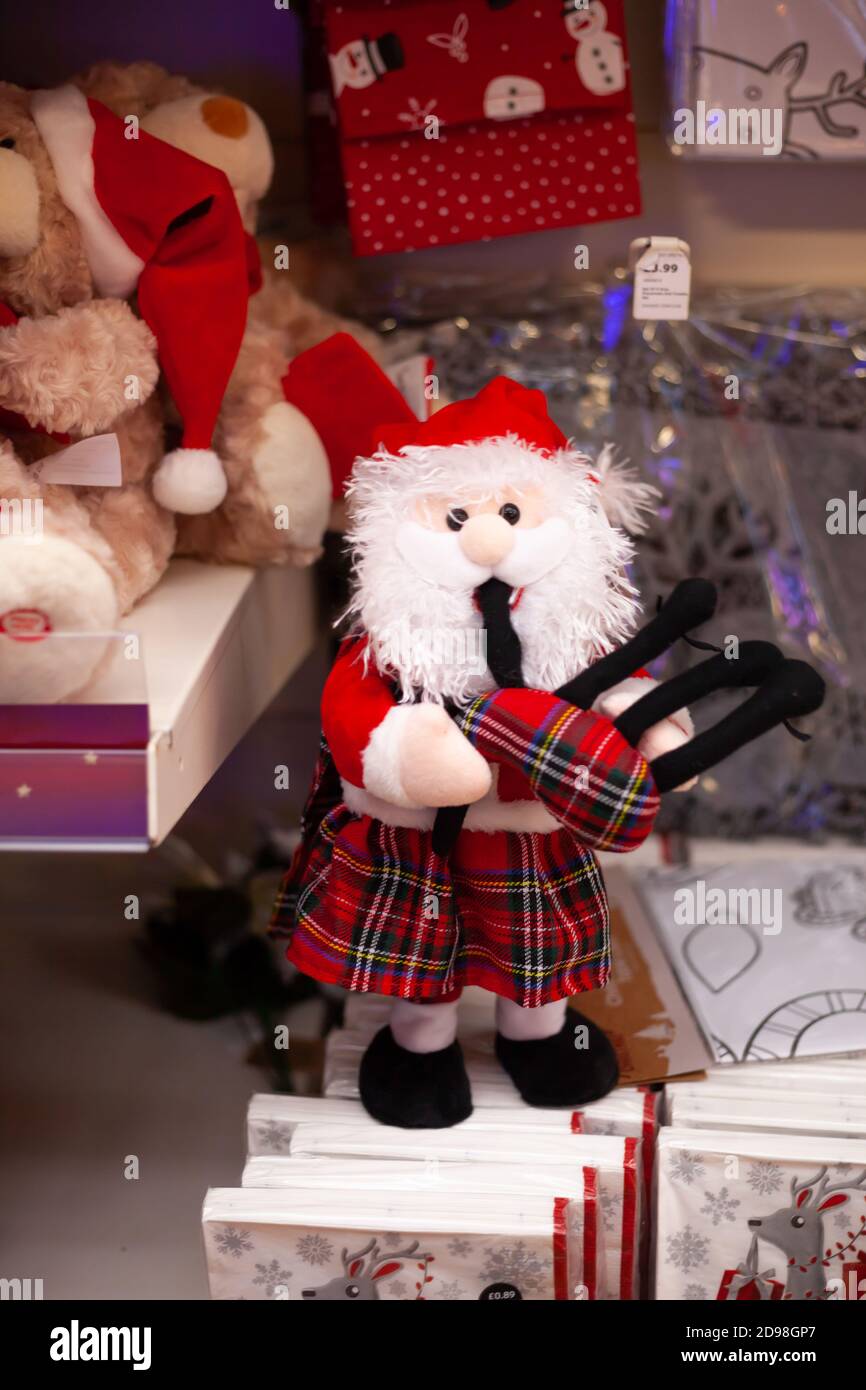 Santa playing bagpipes hi-res stock photography and images - Alamy