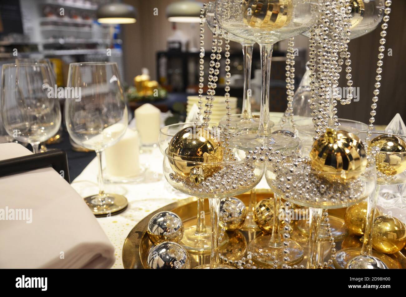 Beautiful gold place setting for Christmas. decorated table for a New ...