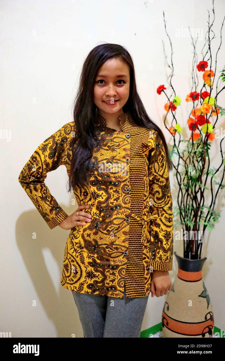 Beautiful Southeast Asian women wearing beautiful colorful tie dye ...