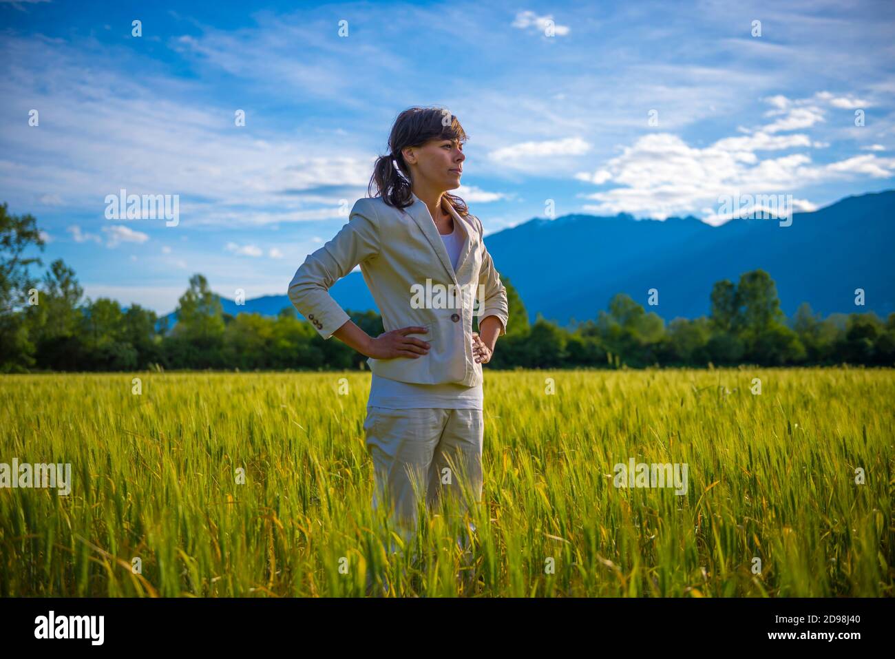Woman standing proud hands on hips hi-res stock photography and images ...