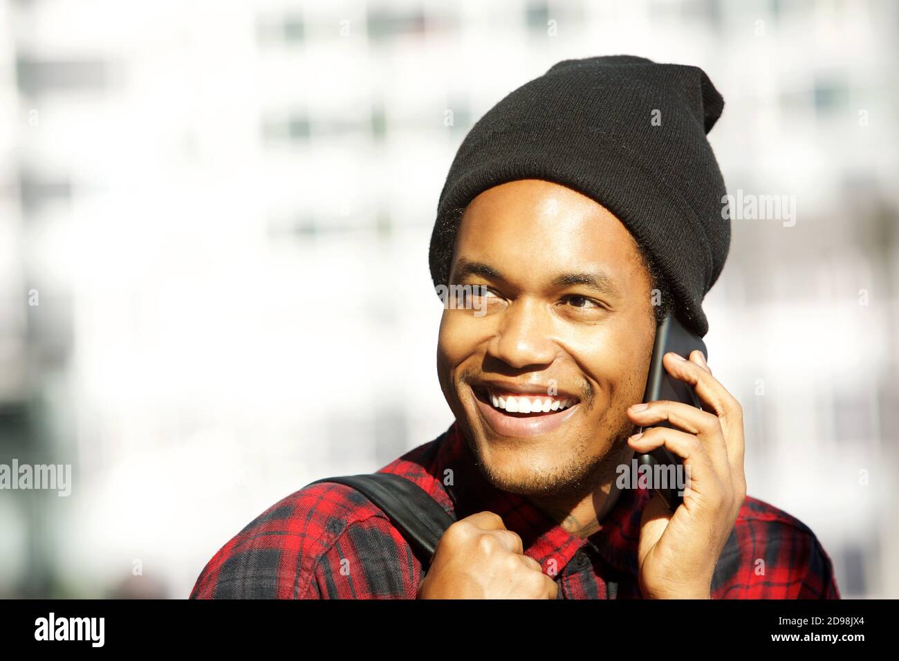 Close up portrait of smiling african american man talking with ...