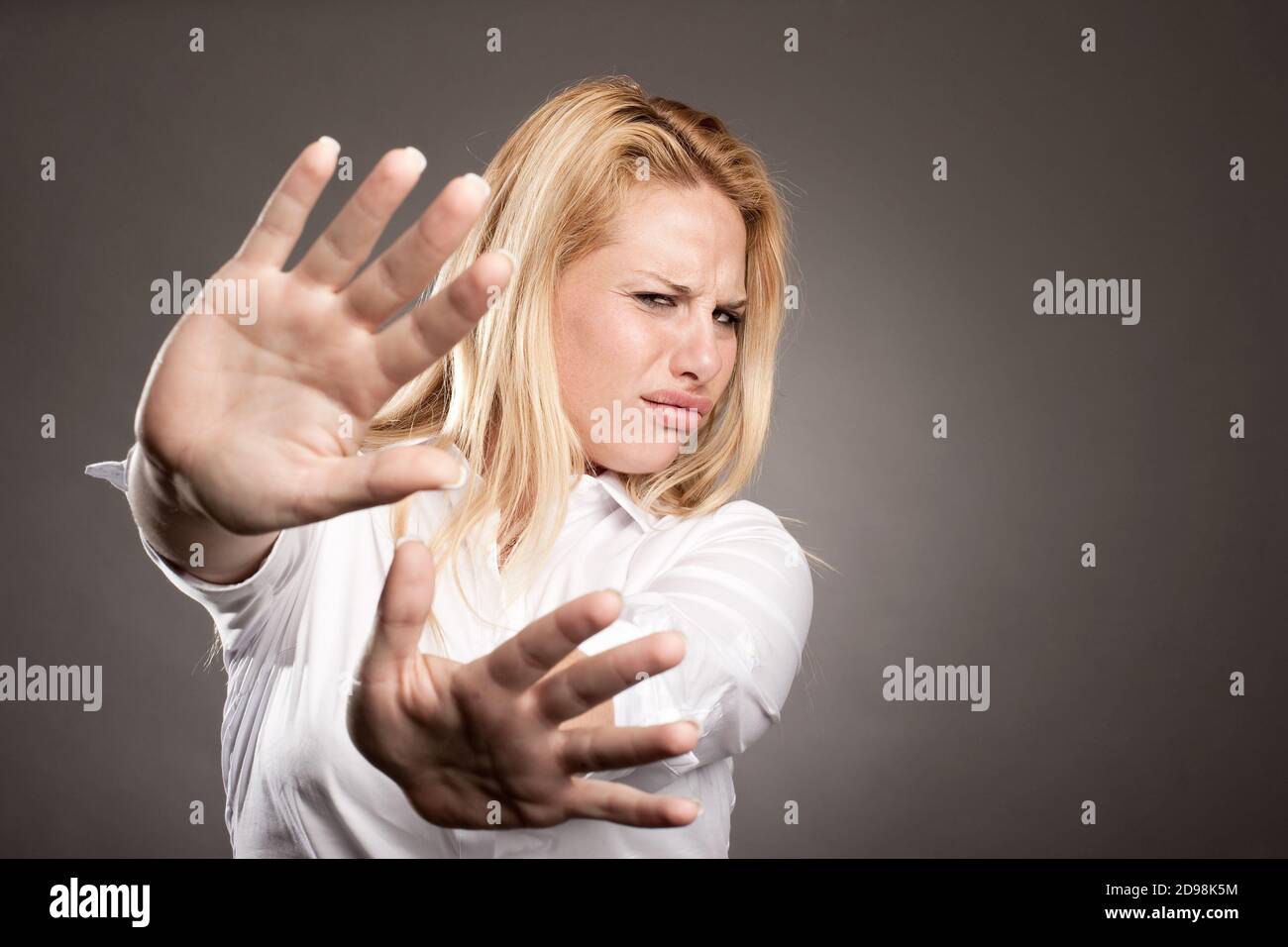 unhappy young woman with disapproval expression Stock Photo - Alamy
