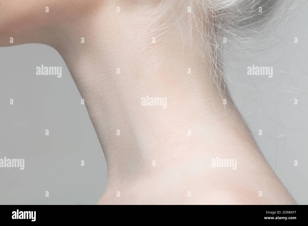 Neck. Close up portrait of beautiful albino female model. Parts of face ...