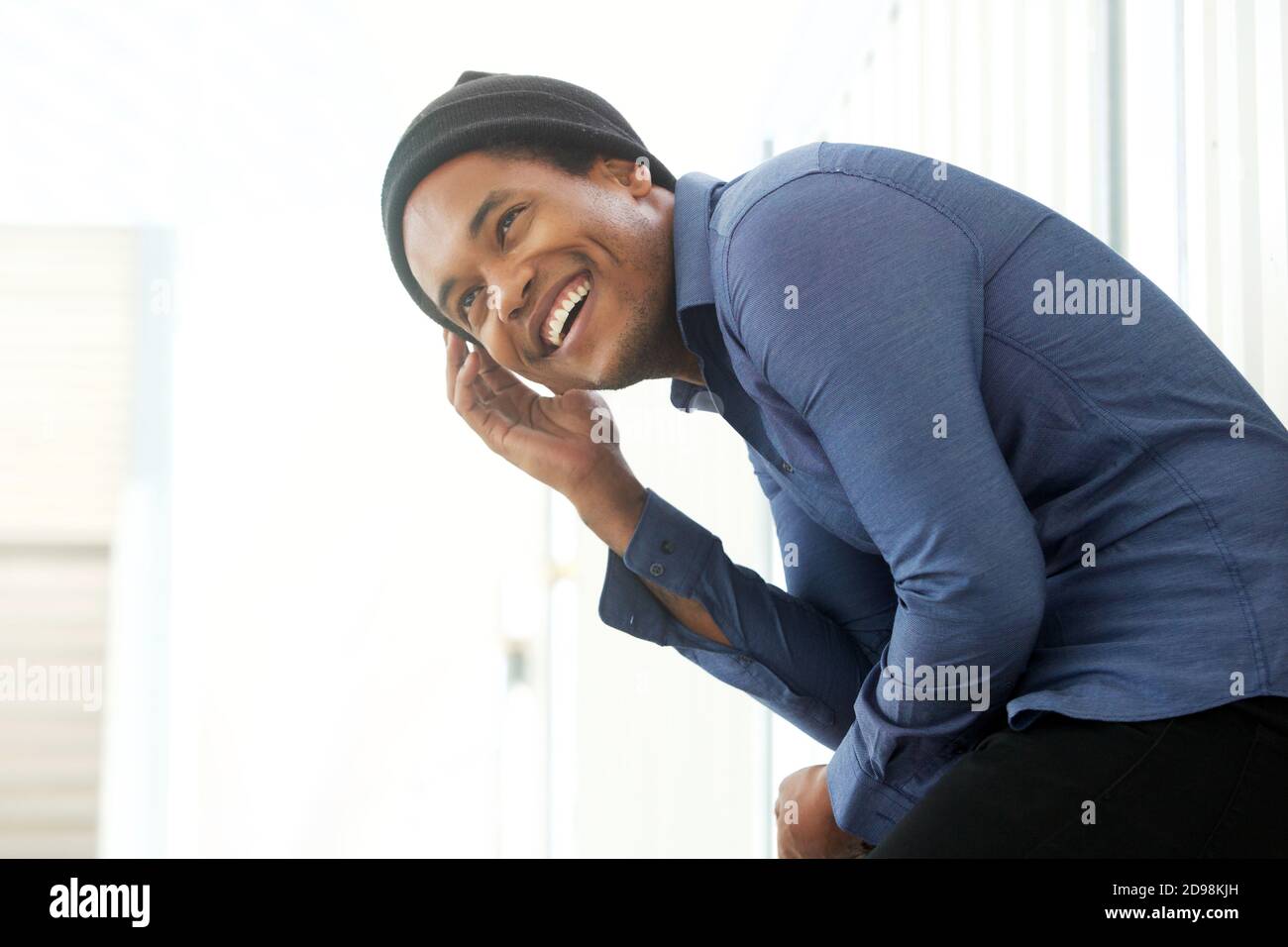Side portrait laughing black guy hi-res stock photography and images ...