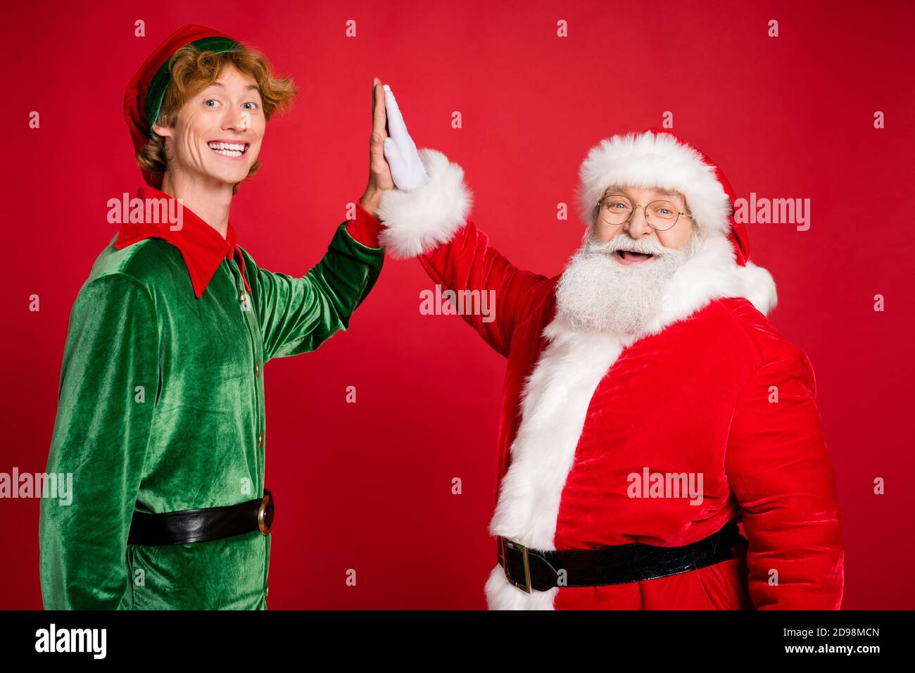 Profile photo of two men santa claus elf clap palms give five wear x ...
