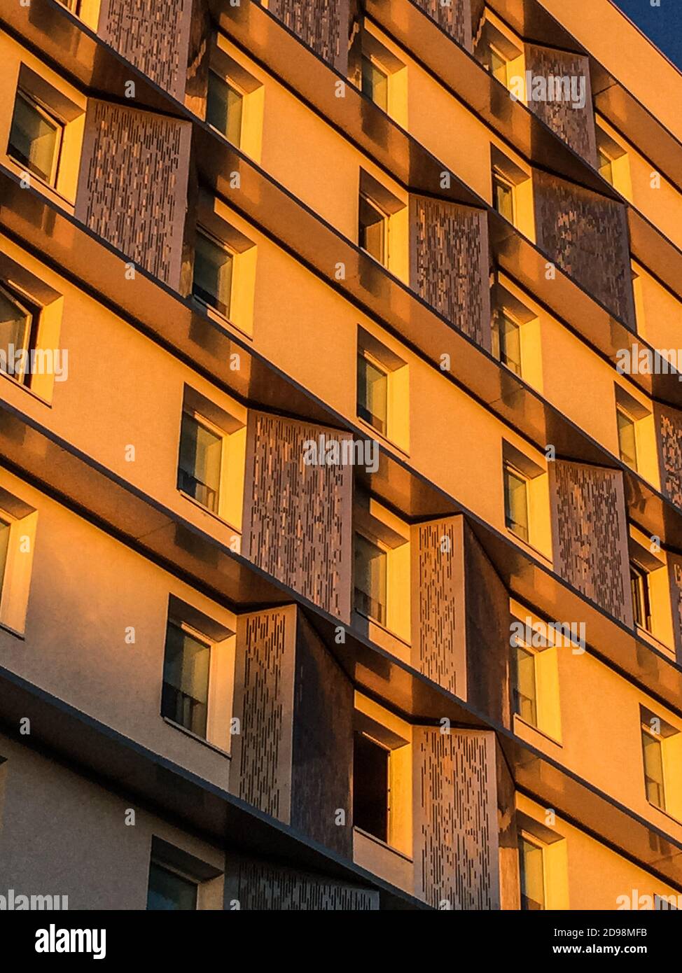 Late Afternoon Sun on Apartment Building Stock Photo - Alamy