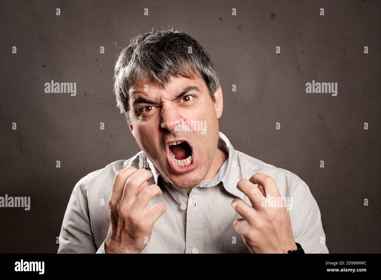 portrait of man with angry expression Stock Photo - Alamy