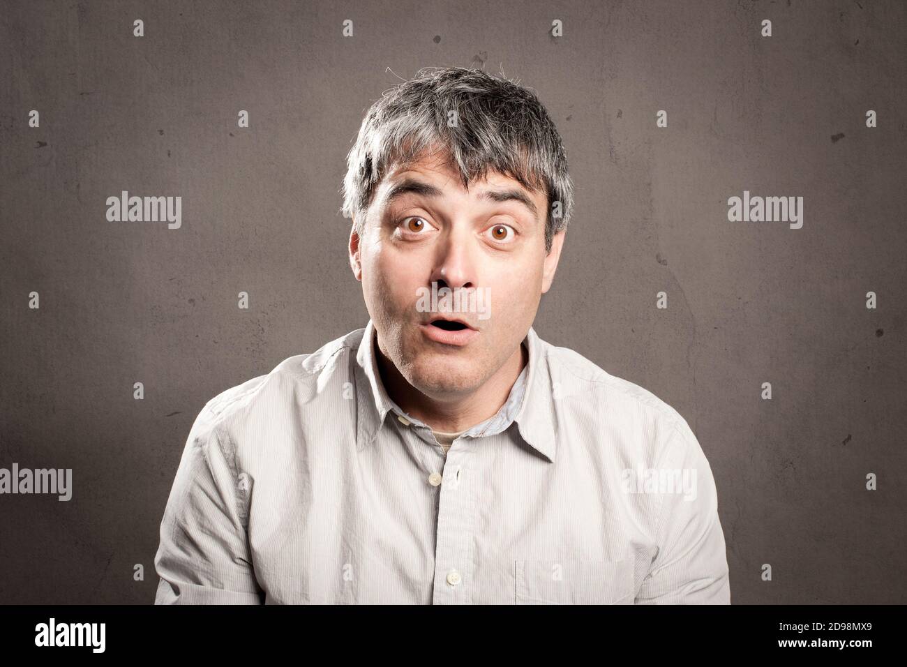 portrait of man with surprised expression Stock Photo - Alamy