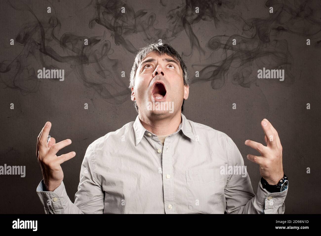 portrait of man with angry expression Stock Photo - Alamy