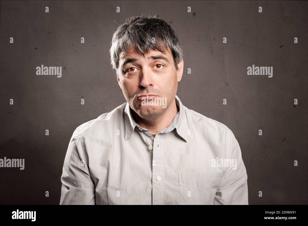 portrait of man with sad expression Stock Photo - Alamy
