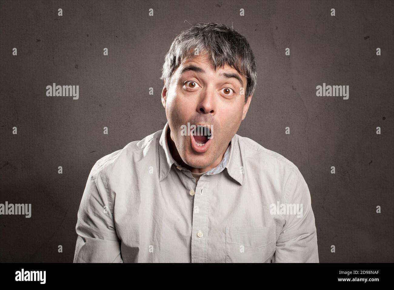 portrait of man with surprised expression Stock Photo - Alamy