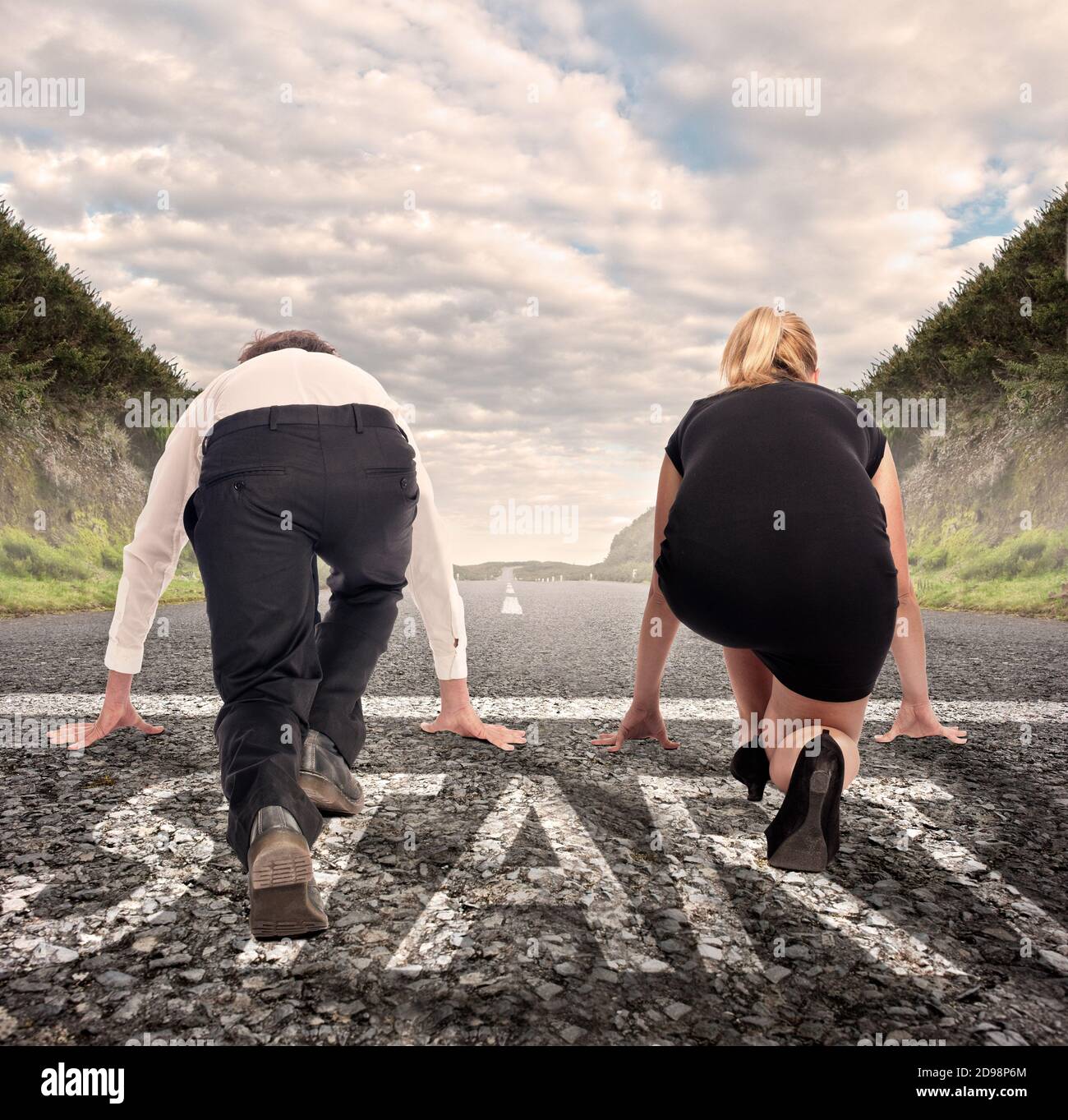 man versus woman on a road ready to run Stock Photo - Alamy