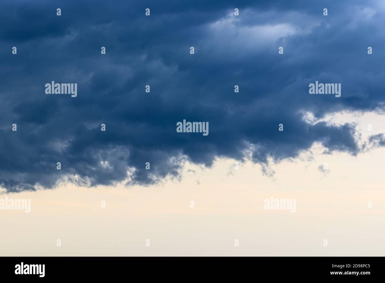 Dark blue heavy storm clouds before a thunderstorm or hurricane ...