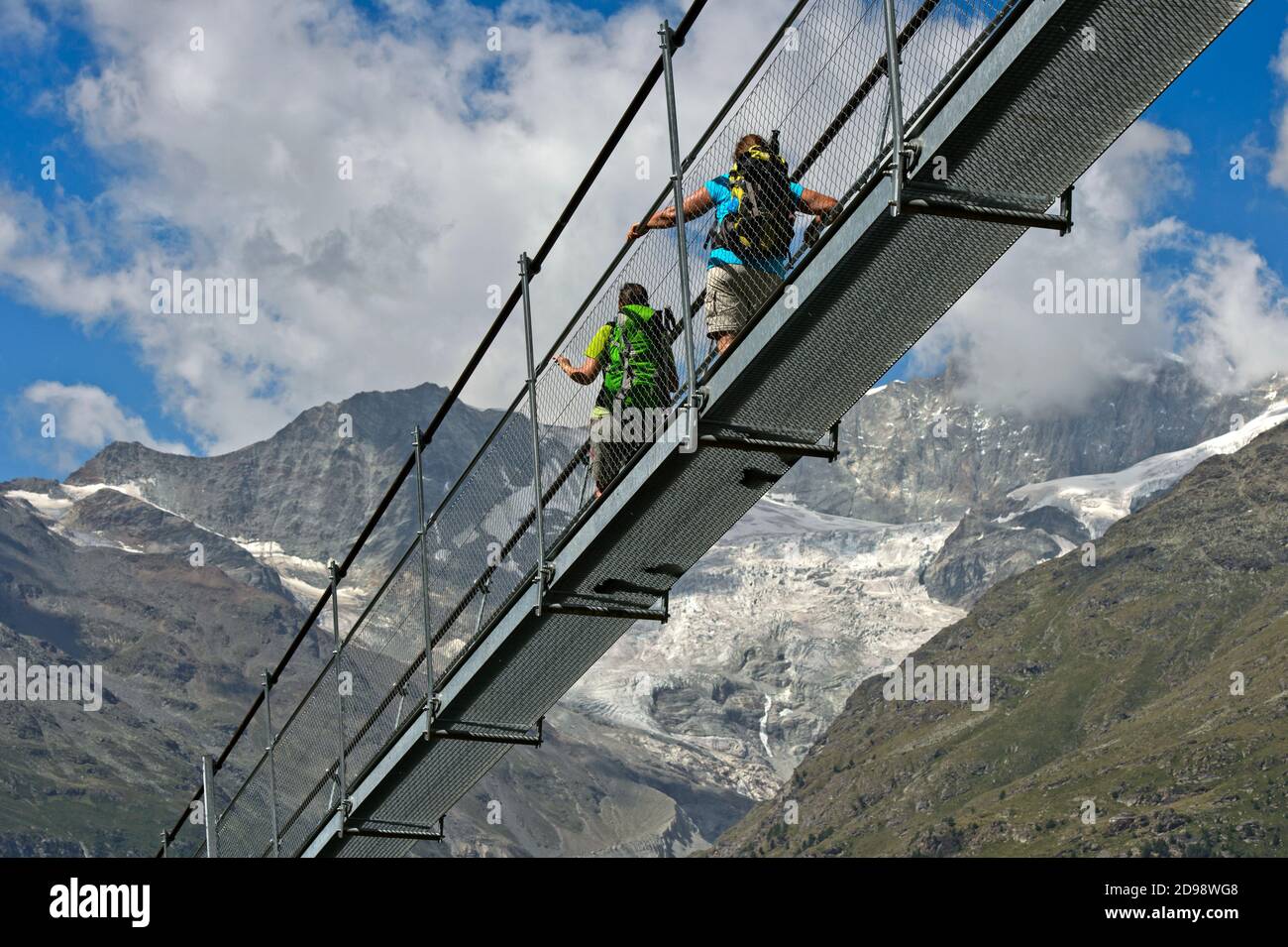 Hikers on the Charles Kuonen Suspension Bridge, Randa, Valais ...