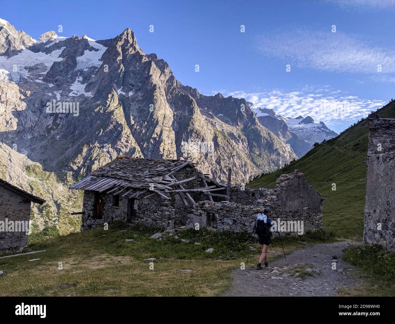 A scenic view of Alpine mountains on a beautiful sunny day. Rocky hills ...