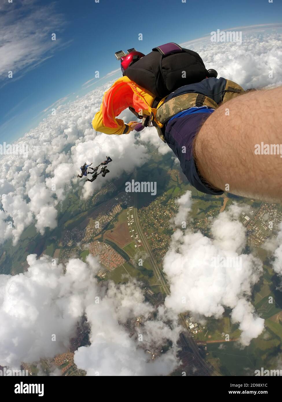 Point of view of a camera attached in the leg of the skydiver. Fish eye ...