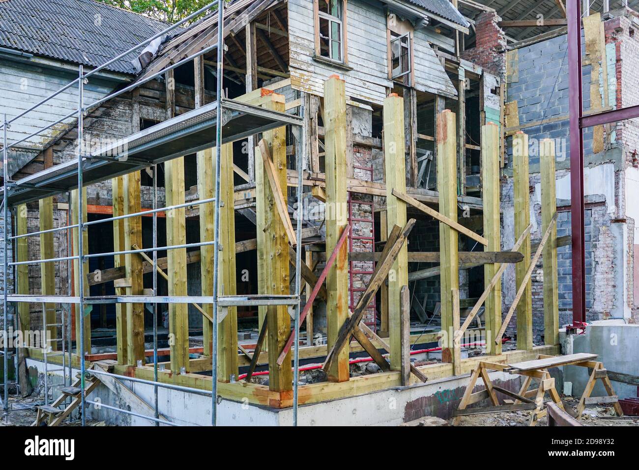 complete reconstruction of an old house, replacement of roof and wall ...