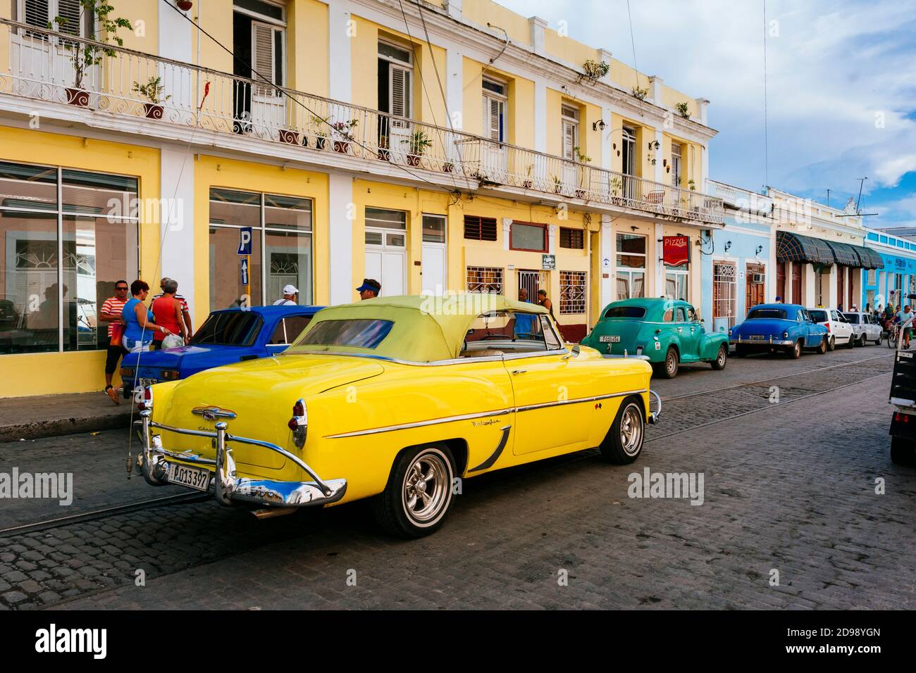 Yellow Chevrolet Bel Air Convertible on a cobbled street. Cienfuegos ...