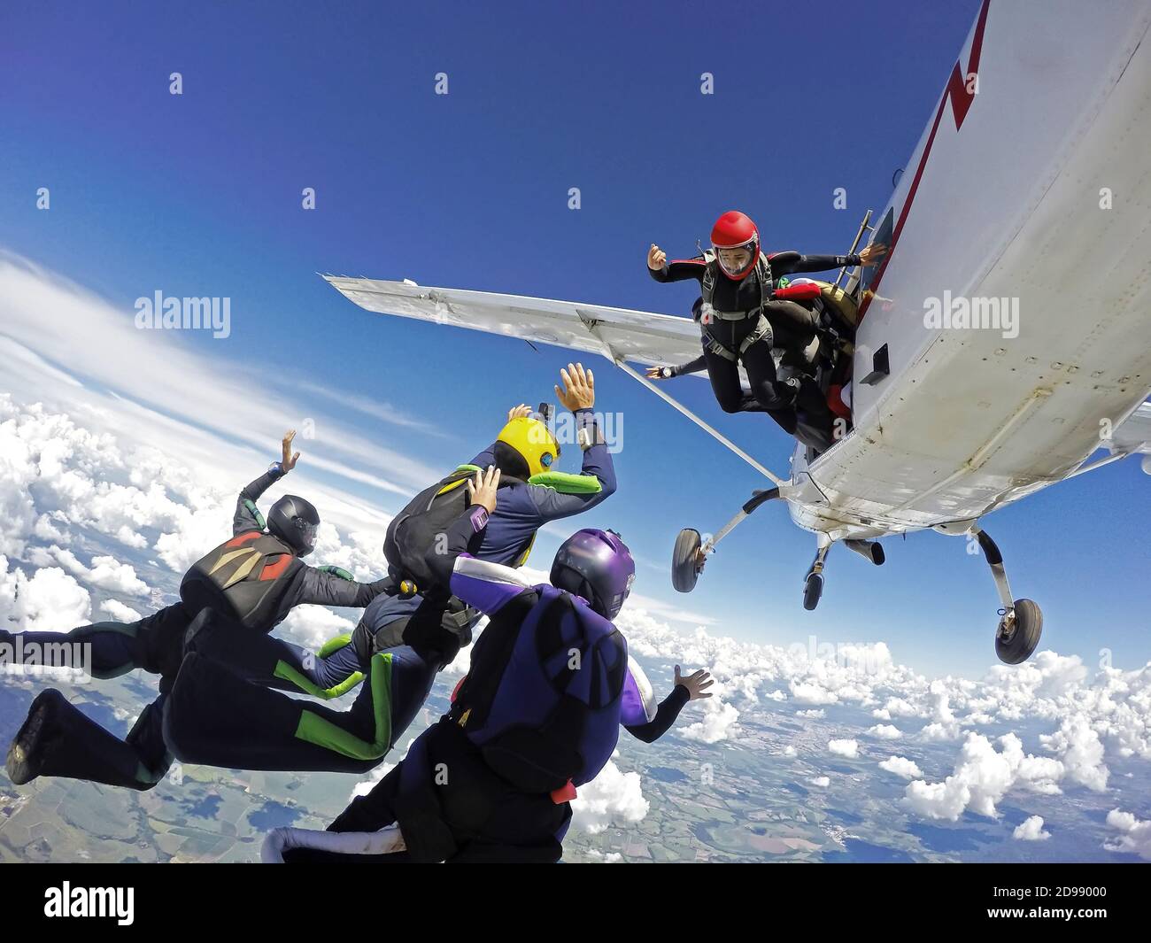 Skydiving group formation Stock Photo - Alamy