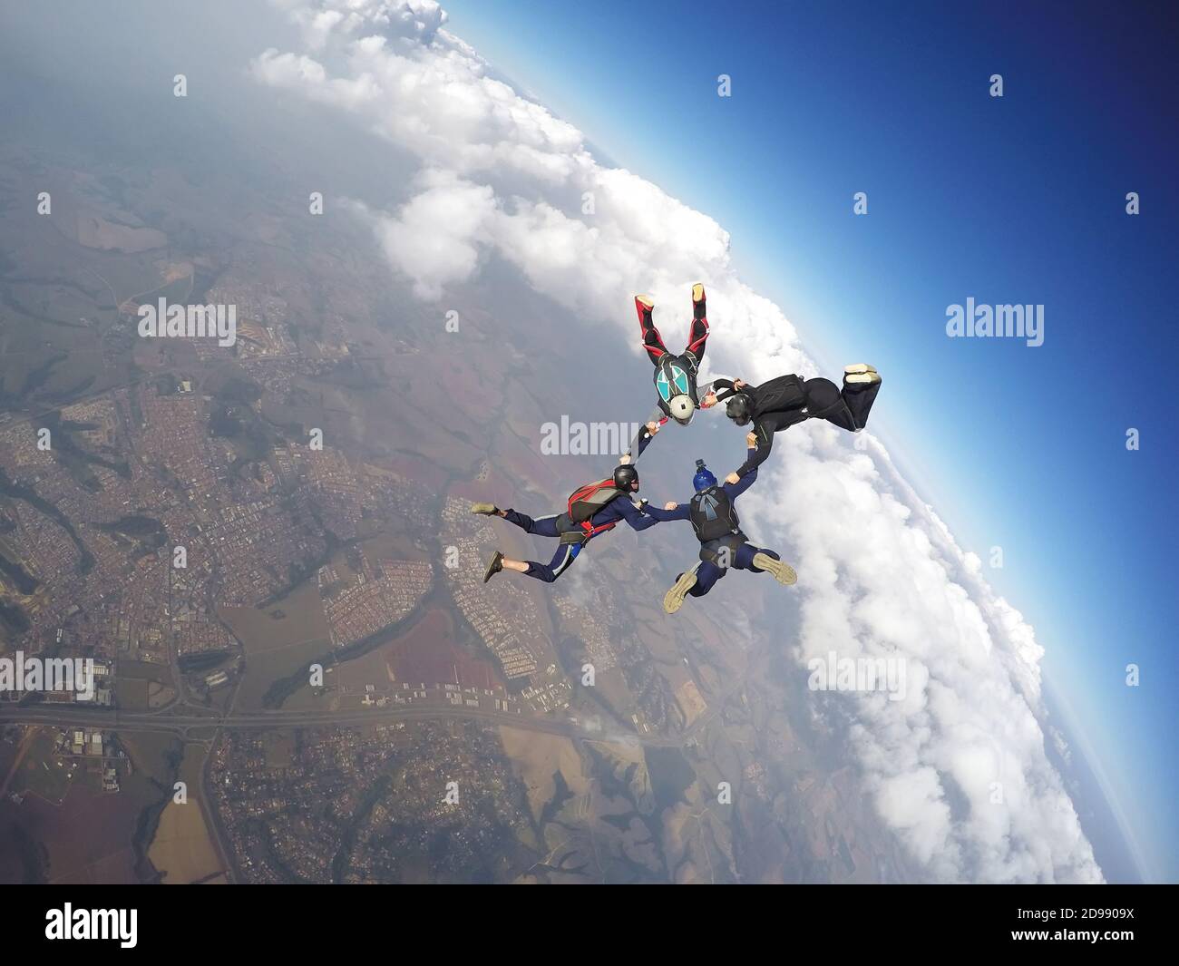 Sky diving team making figures Stock Photo - Alamy