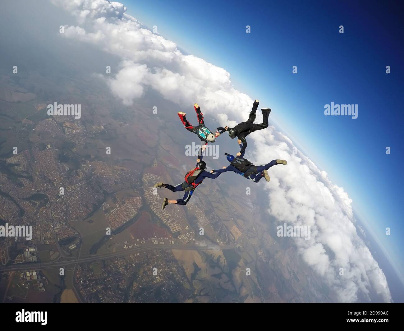 Sky diving team making figures Stock Photo - Alamy