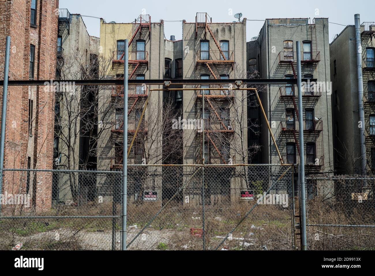 Old buildings behind the fence Stock Photo - Alamy