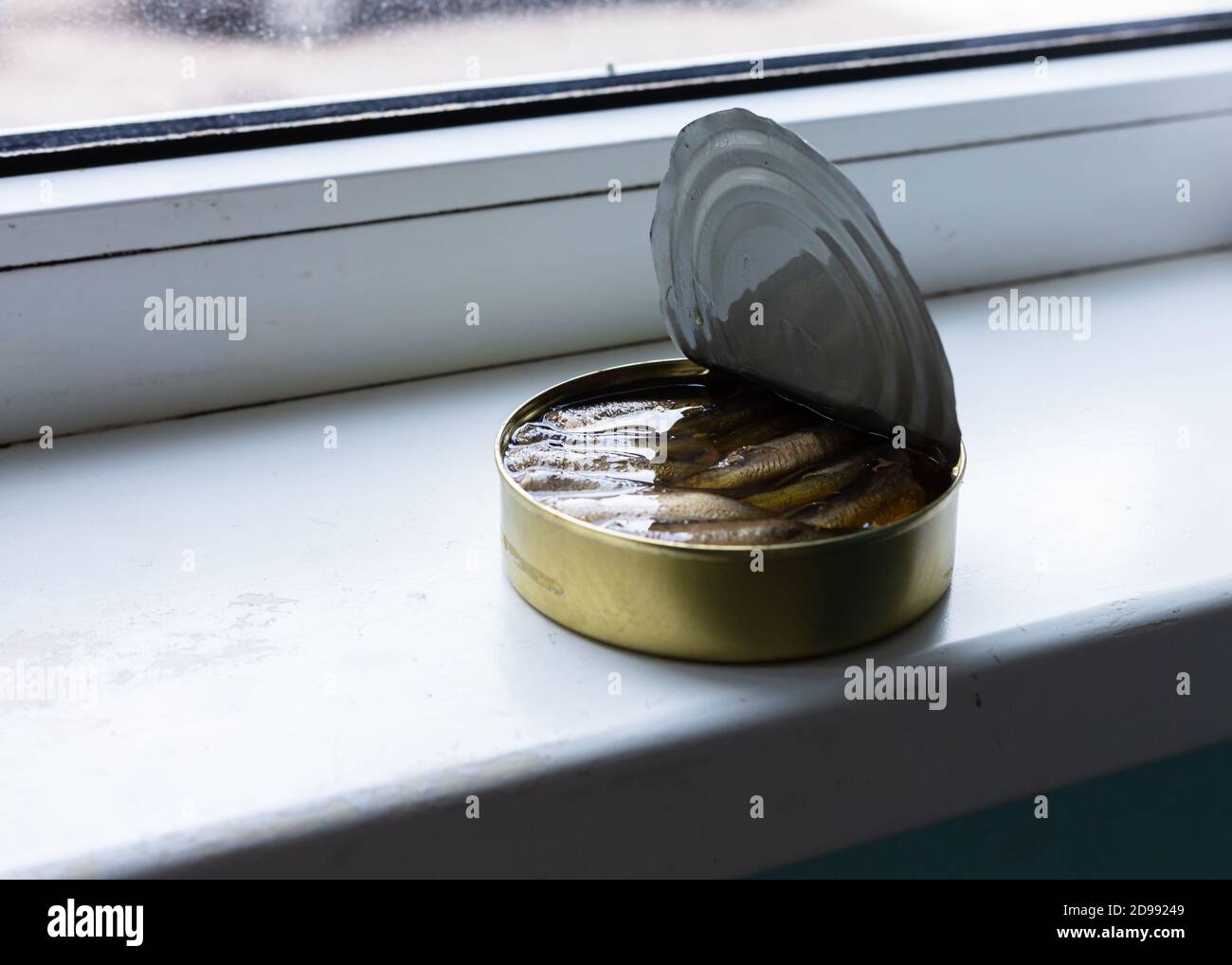 Opened tin of canned fish Stock Photo - Alamy