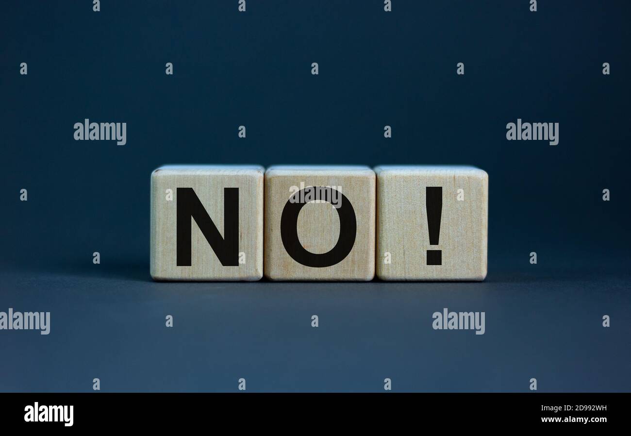 Wood blocks with word 'no' on grey background, copy space. Business ...