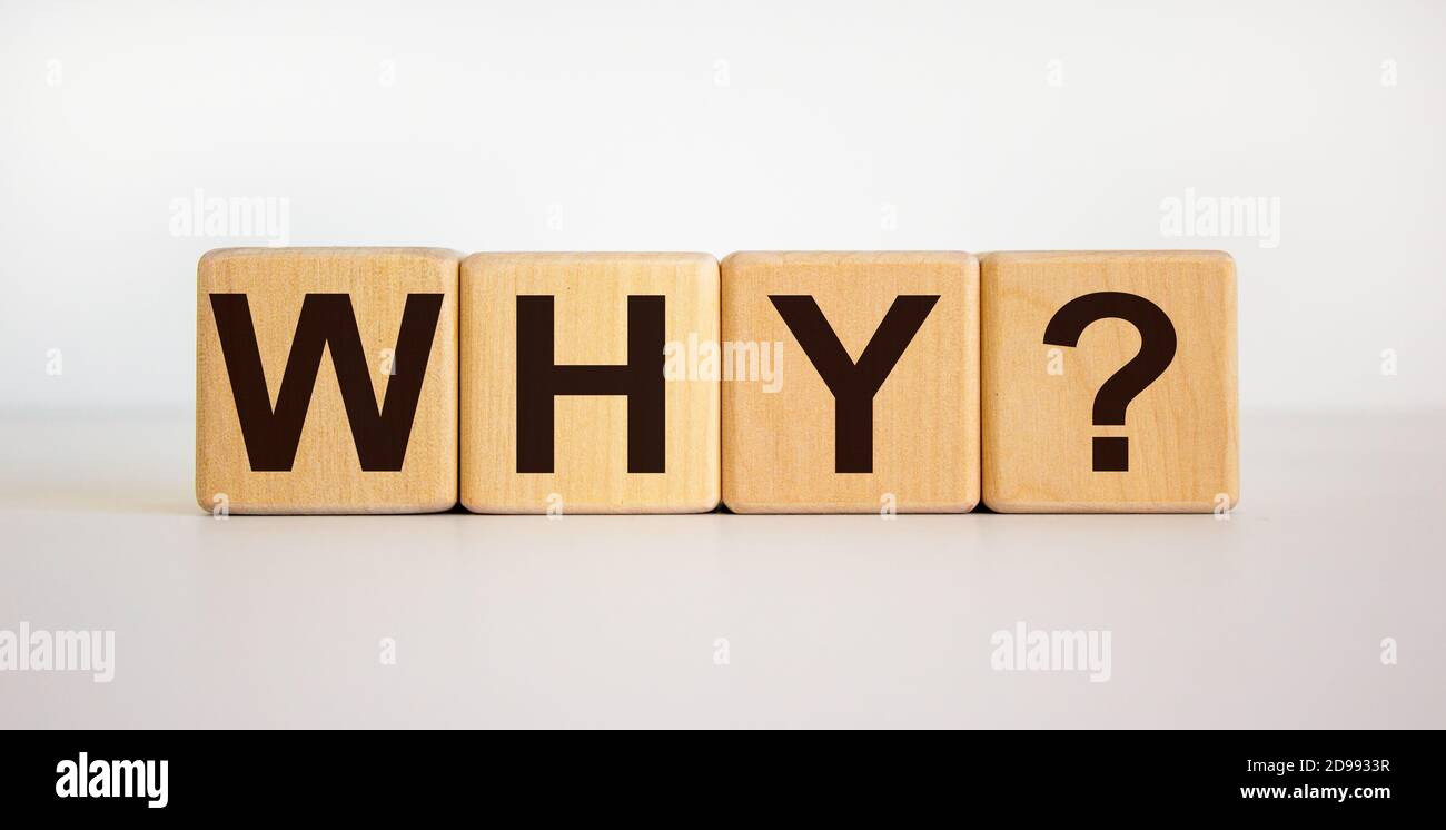 Concept word 'why' on wooden cubes on a beautiful white background ...