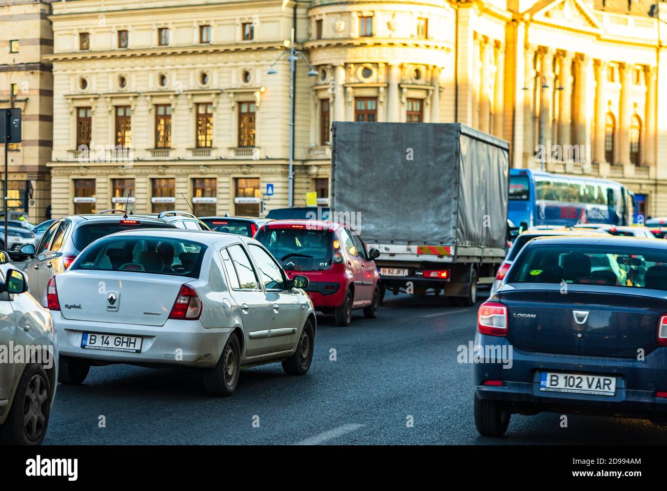 Car traffic at rush hour in downtown area of the city. Car pollution ...