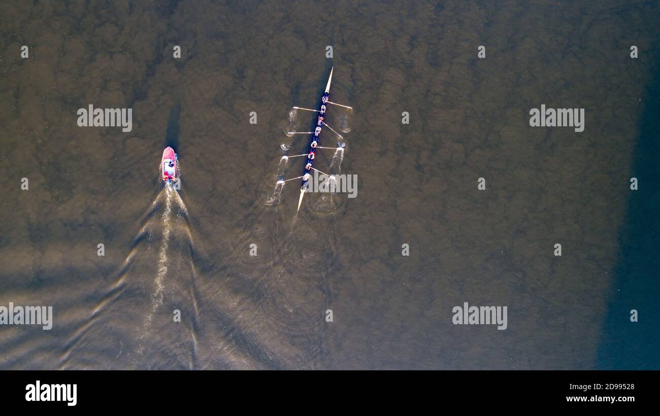 Aerial view of rowers in a racing shell training on Vistula River in ... Aerial view of rowers in a racing shell training on Vistula River in ...