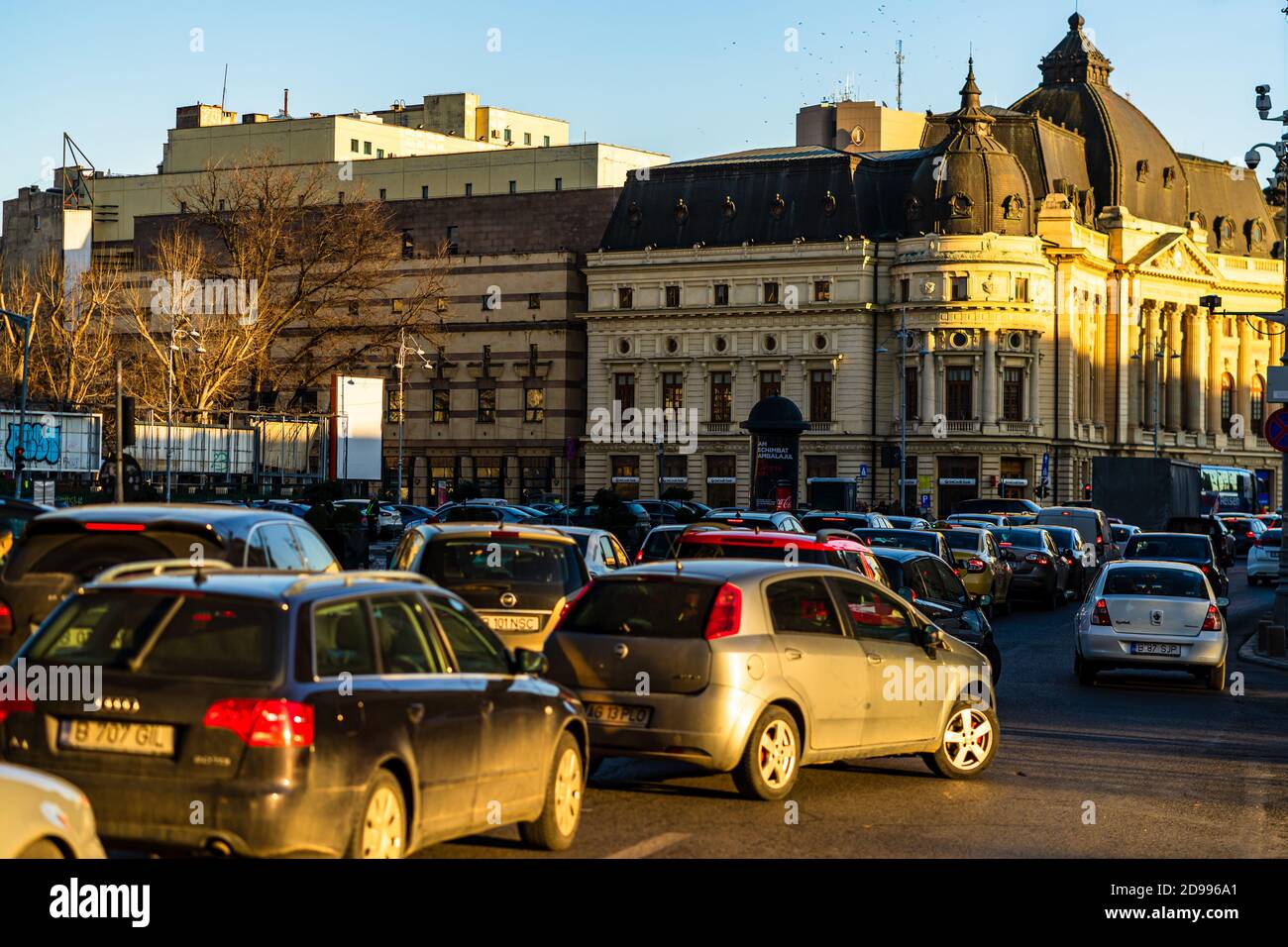 Car traffic at rush hour in downtown area of the city. Car pollution ...