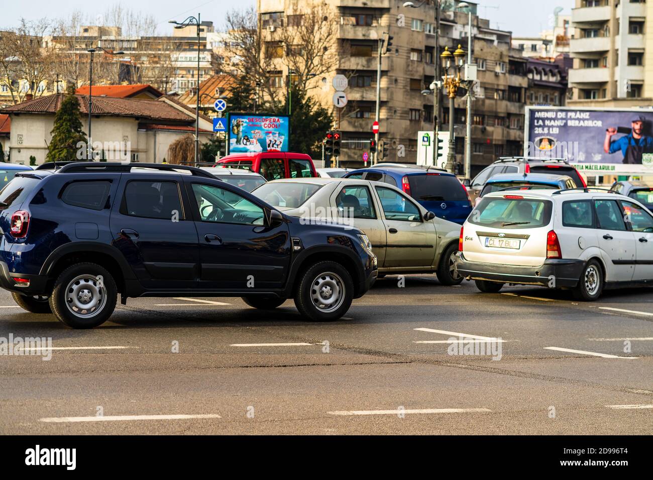 Car traffic at rush hour in downtown area of the city. Car pollution ...