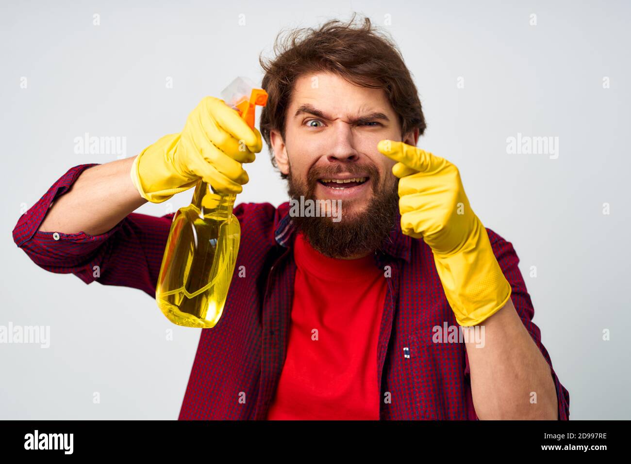 bearded man detergent rubber gloves rendering service cropped view ...