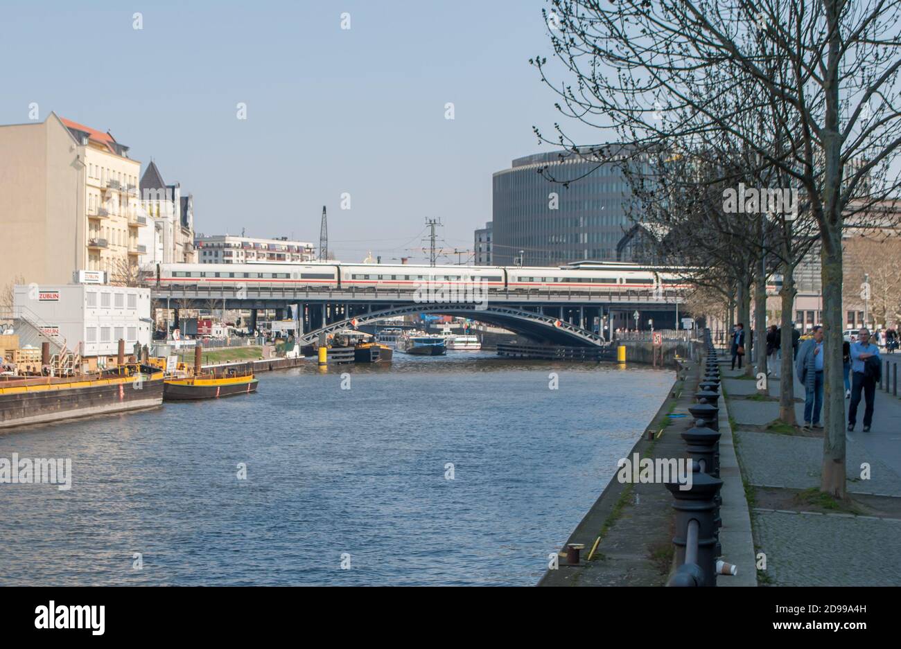 Spree river in Berlin, bridge and train on the bridge Stock Photo - Alamy