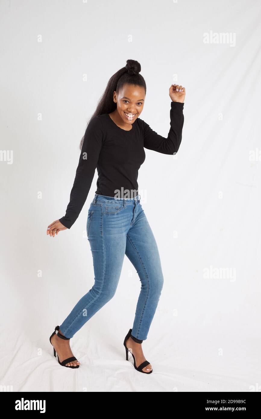 Lovely Black woman dancing for joy Stock Photo - Alamy