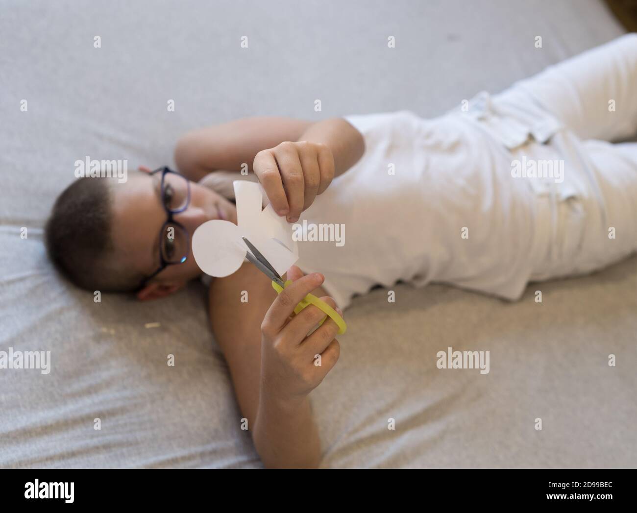 Closeup shot boy cutting hi-res stock photography and images - Alamy