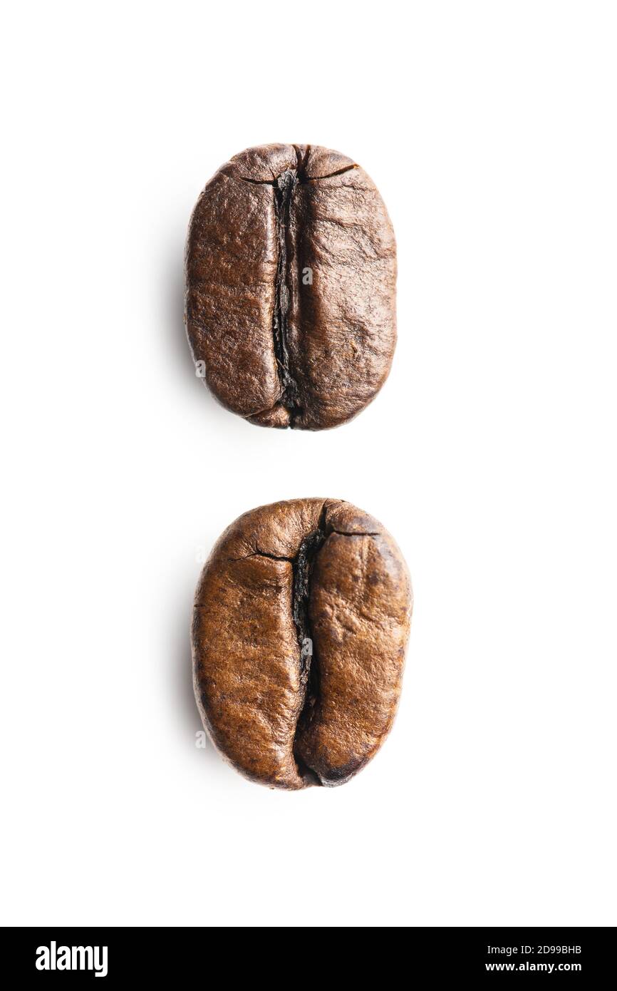 Robusta and arabica roasted coffee beans isolated on white background ...