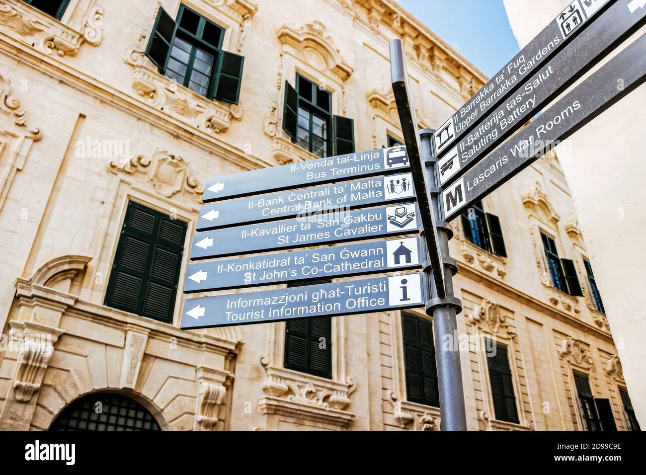 cityscape with road guide sign in Valletta Malta Stock Photo - Alamy