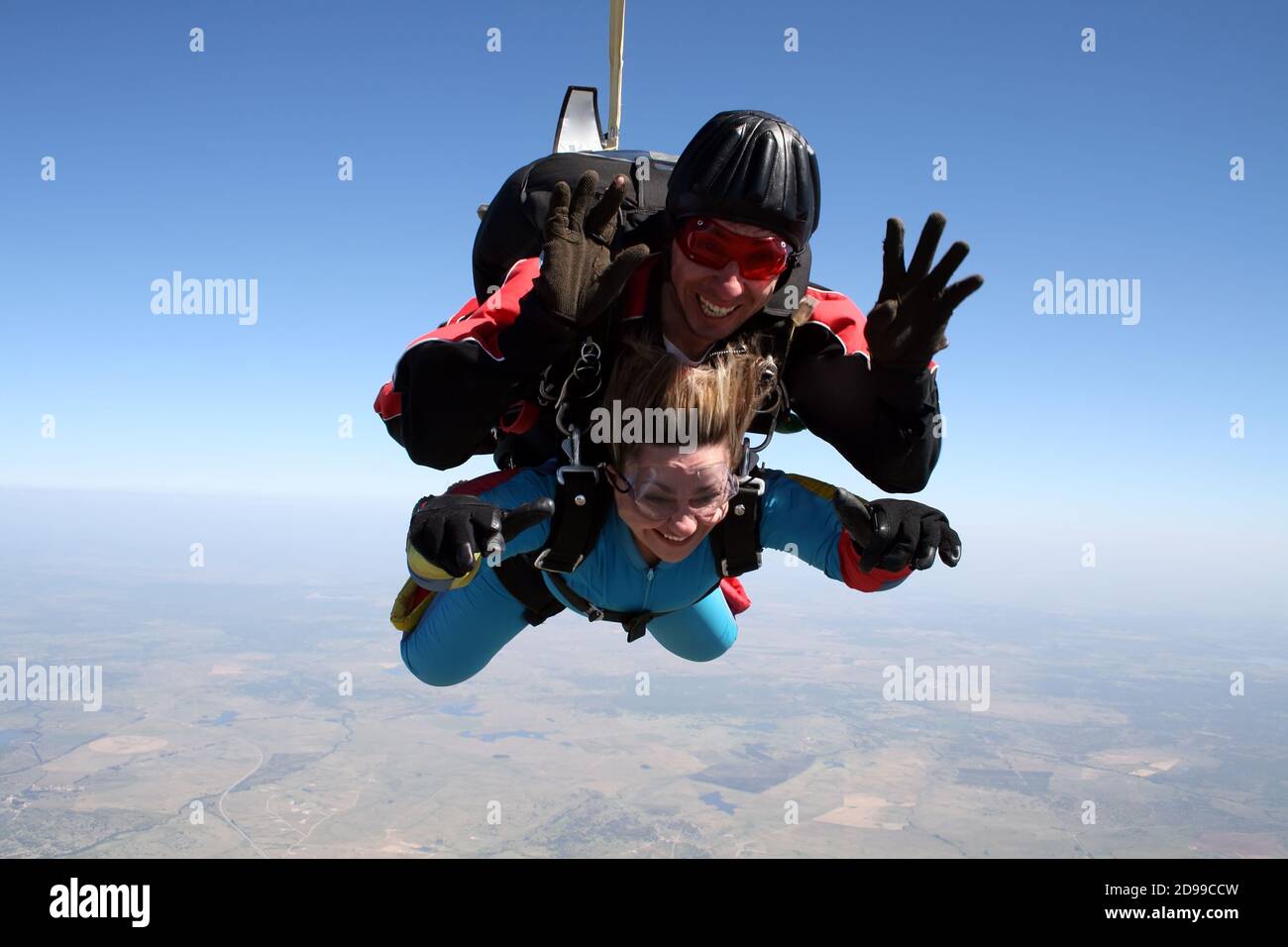 Skydive tandem jumping ou the plane Stock Photo - Alamy