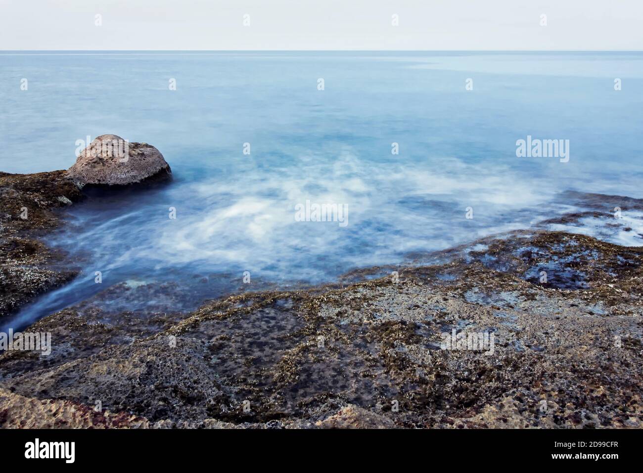 long exposure of peaceful ocean at coast in Malta island Stock Photo ...