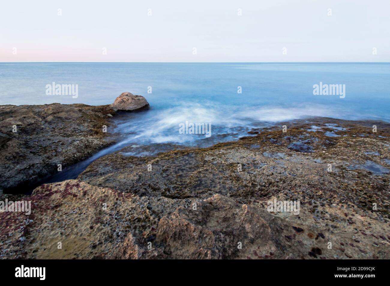 long exposure of peaceful ocean at coast in Malta island Stock Photo ...