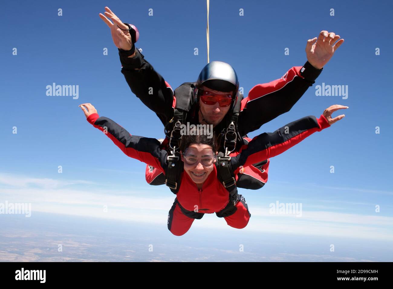 Sky diving tandem red color Stock Photo - Alamy