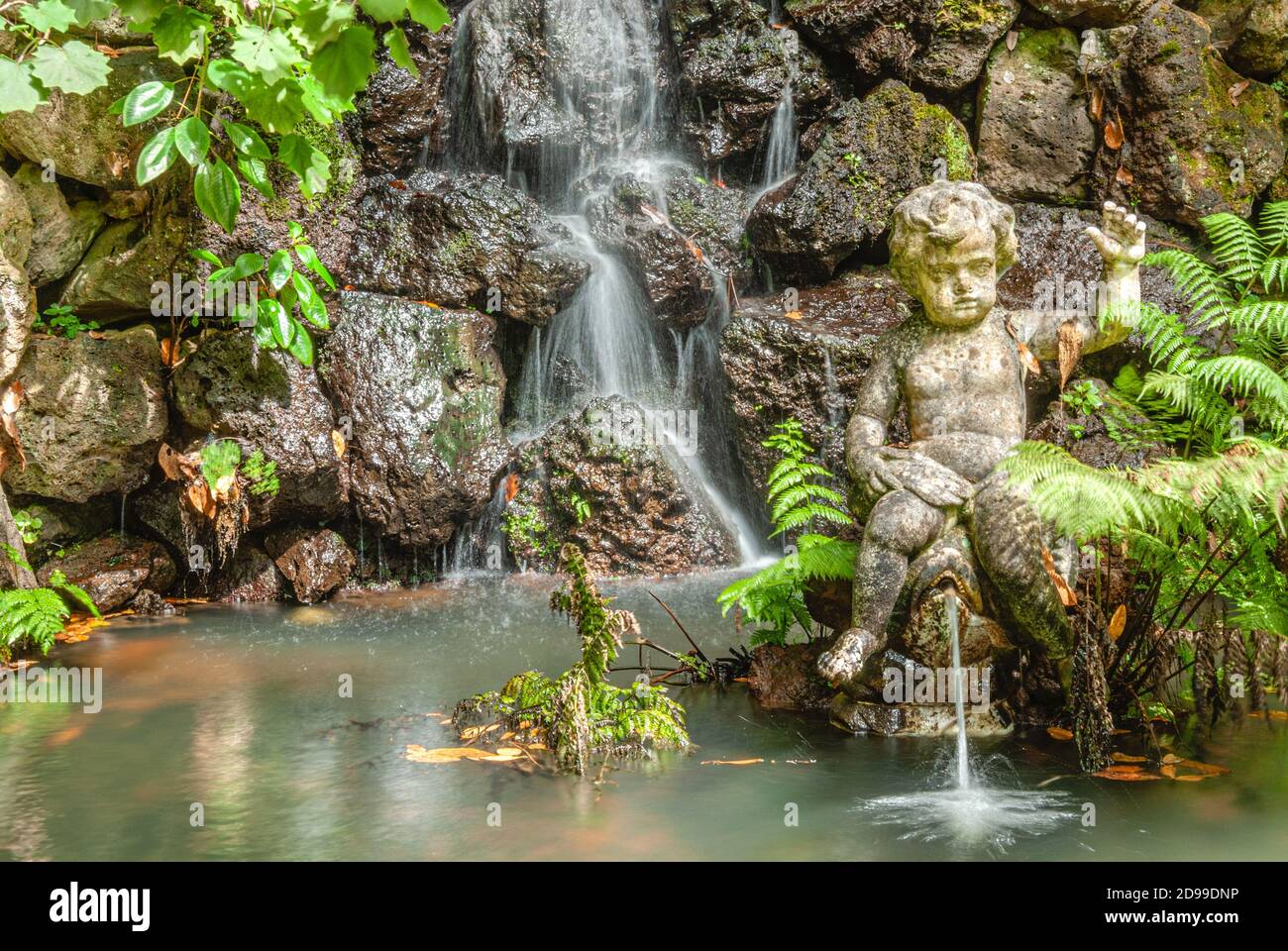 Fountain with angel sculpture at the Monte Palace Garden in Funchal ...