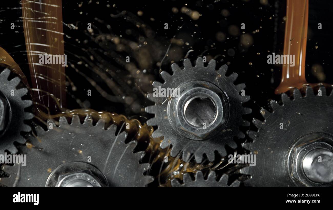 Tooth gear wheel with oil splashes, freeze motion, lubrication concept ...